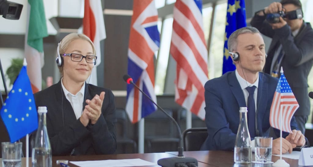 Videos of simultaneous translators - Interpreting live on TV